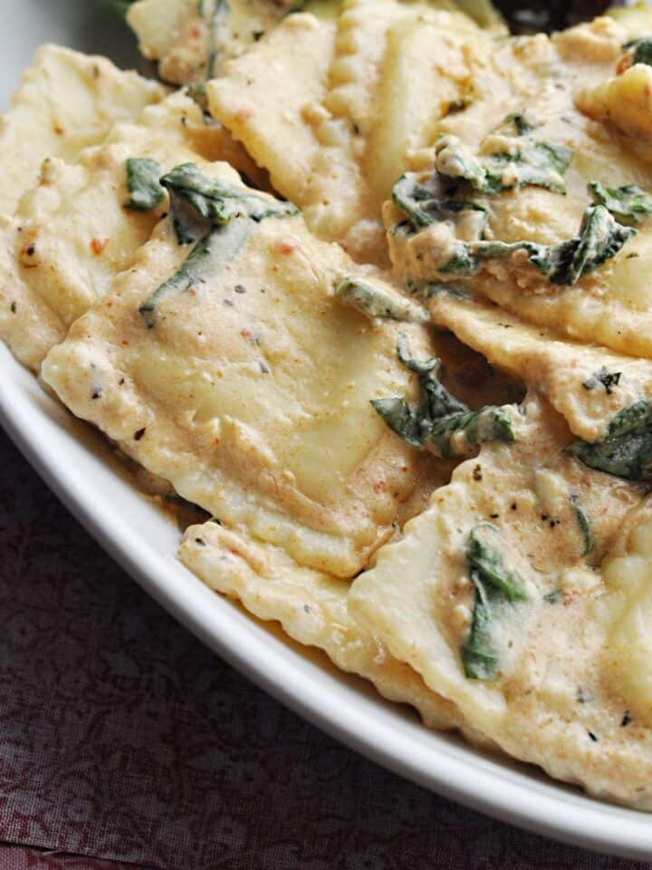 Spinach Ravioli Recipe with Tomato Basil Cream Sauce - Savory With Soul