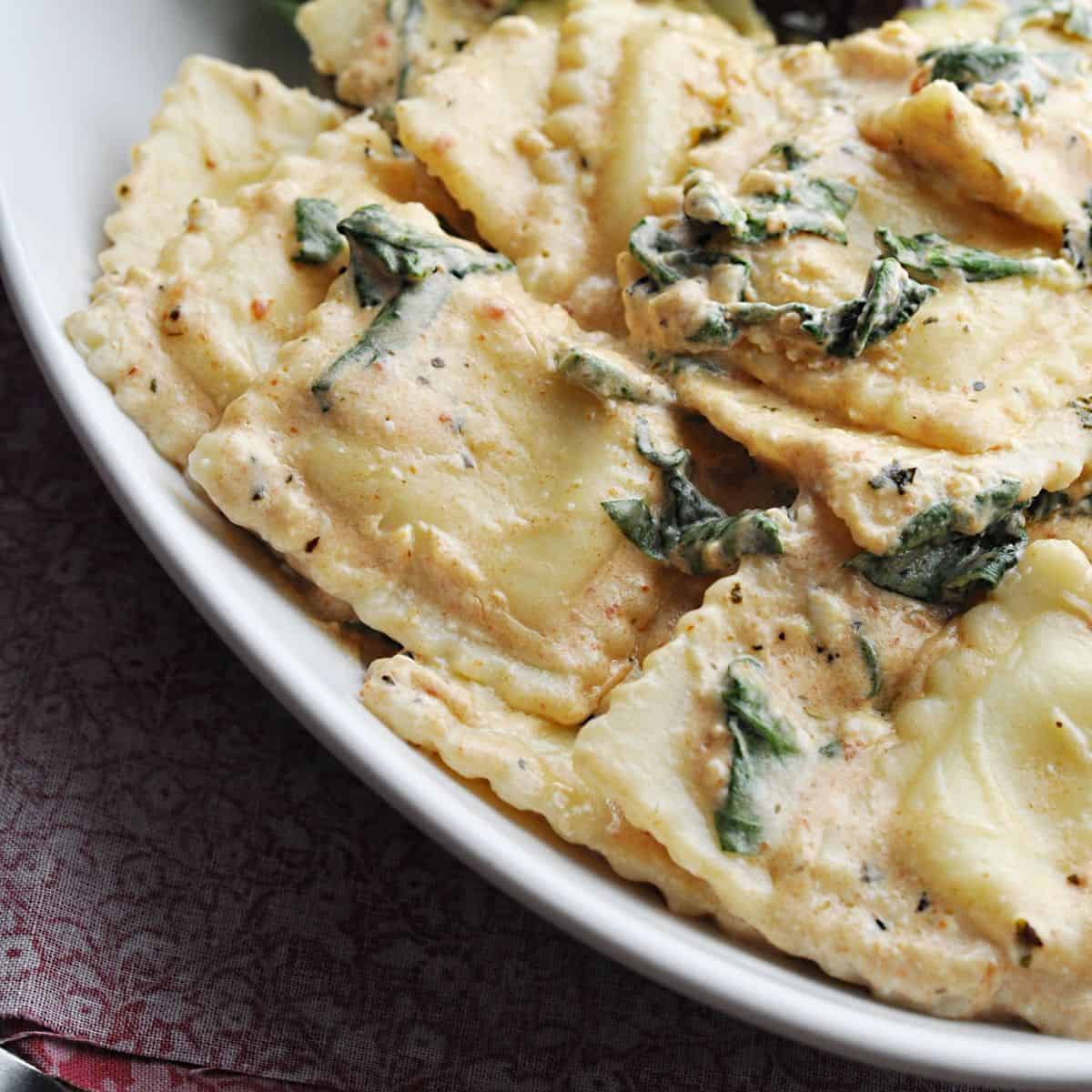 Spinach Ravioli Recipe with Tomato Basil Cream Sauce - Savory With Soul